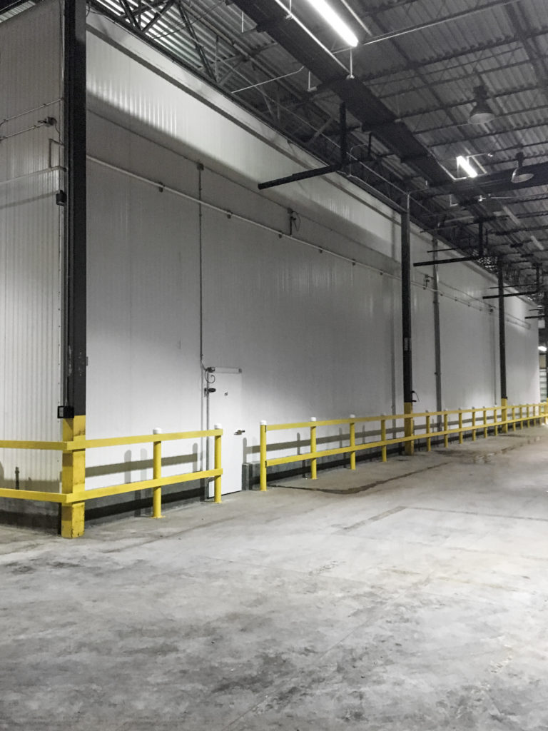 Design build cold storage freezer and cooler with bollards | Advanced ...